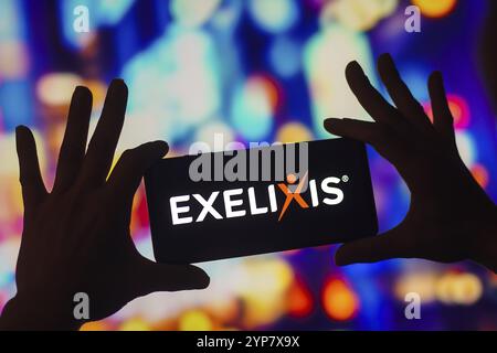 In this photo illustration, the Exelixis logo is displayed on the ...