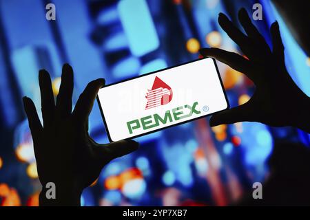 In this photo illustration, the Pemex logo is seen displayed on a ...