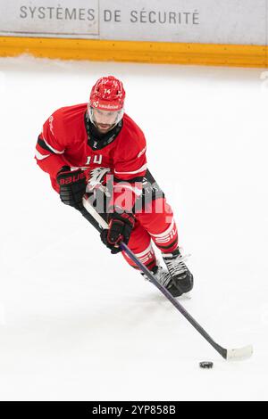 Lausanne, Switzerland. , . Jason Fuchs (offense) of Lausanne HC #14 in ...