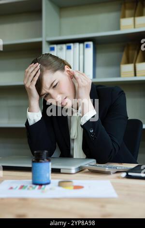 Businesswoman in poor physical condition Stock Photo - Alamy