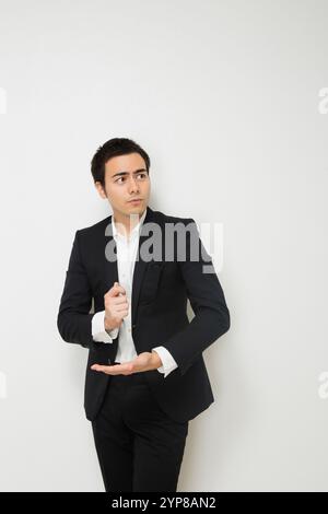 Businessman in an inspirational pose Stock Photo - Alamy