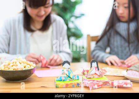 Child doing origami Stock Photo - Alamy