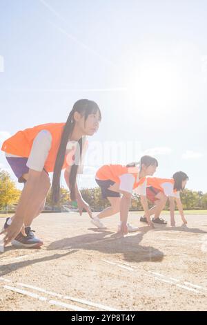 High school students lining up at the start line Stock Photo - Alamy