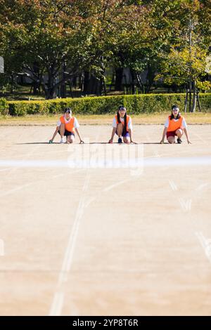 High school students lining up at the start line Stock Photo - Alamy