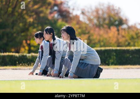 High school students lining up at the start line Stock Photo - Alamy