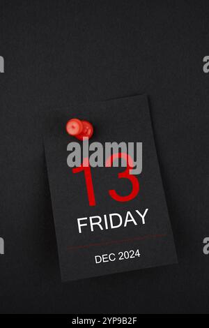 Friday the 13th December calendar 2024 with wooden pin on old paper ...