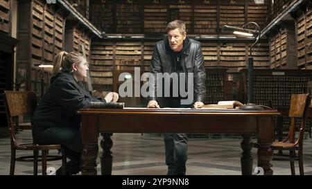 ABIGAIL BRESLIN and AARON ECKHART in CLASSIFIED (2024), directed by ...