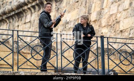ABIGAIL BRESLIN and AARON ECKHART in CLASSIFIED (2024), directed by ...