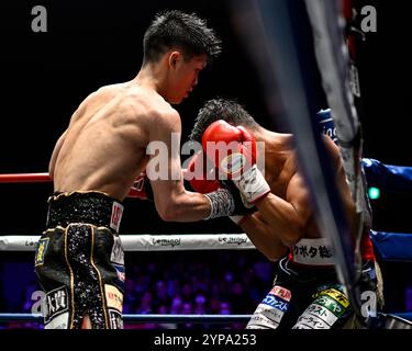 Tokyo, Japan. 21st Nov, 2024. Shu Utsuki (black gloves) hits Katsuya Yasuda (red gloves) in the ...
