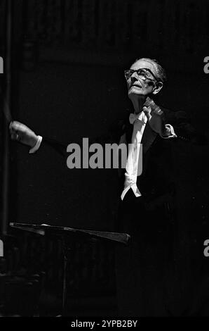 Swiss composer Frank Martin conducting an orchestra at the Teatro Odeón ...