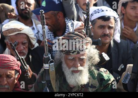 Solidarity rally for Gaza in Sana a - A protester holds anti-Gaza ...