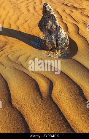 Boulders surrounded by wind-blown sand structures, Huqf stone desert ...