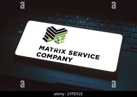 In this photo illustration, a smartphone with the web page of de ...