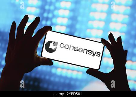 In this photo illustration, the Consensys logo is displayed on a ...