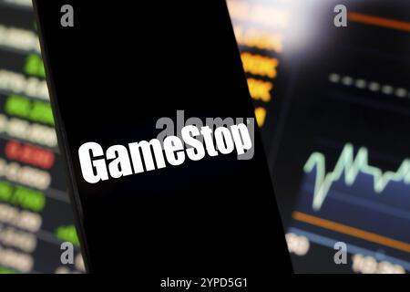 In this photo illustration a GameStop logo is seen displayed on a ...
