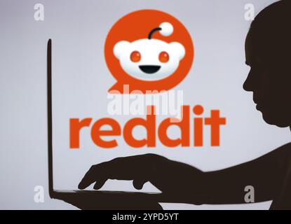 In this photo illustration, a Reddit logo is seen displayed on TV ...