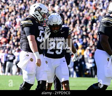 Colorado running back Micah Welch (29) runs against BYU cornerback ...