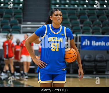 UCLA center Lauren Betts warms up before an NCAA college basketball ...