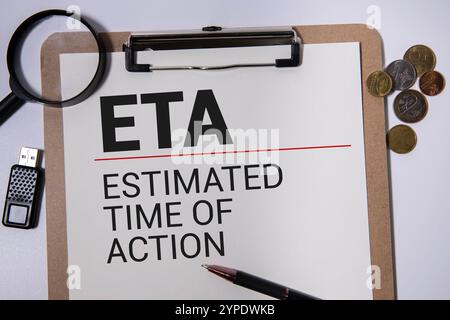 Flash card with handwriting in word ETA (abbreviation of estimated time ...