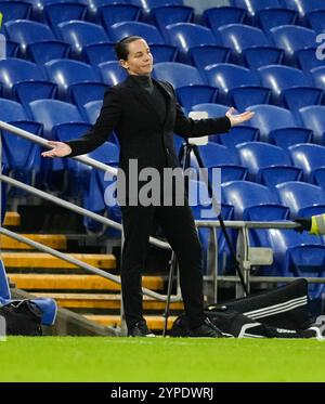 Wales head coach Rhian Wilkinson applauds the fans after the final ...