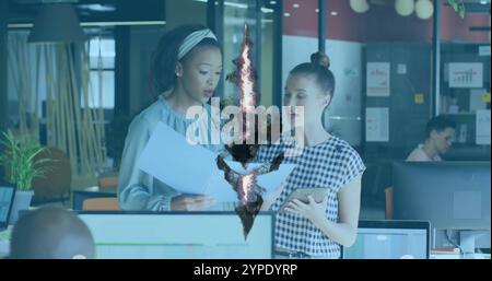 Ethereum logo image over diverse business people working in modern ...