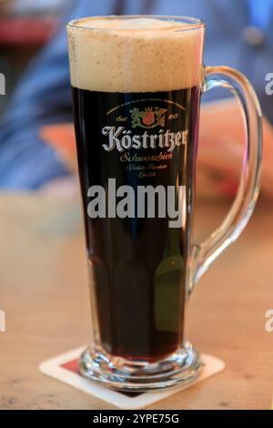 Glass with black beer. Dark beer, Schwarzbier Stock Photo - Alamy