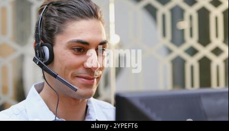 Smiling customer support executive Stock Photo - Alamy