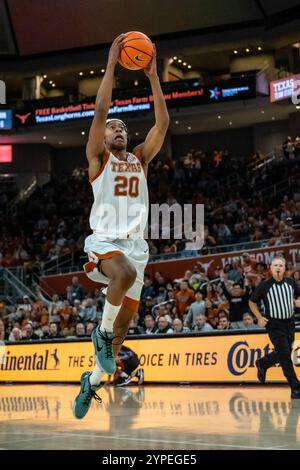 Texas, USA. 29th Nov, 2024. Tre Johnson #20 of the Texas Longhorns in ...