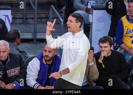 Oklahoma City Thunder coach Mark Daigneault blows a gum bubble during ...