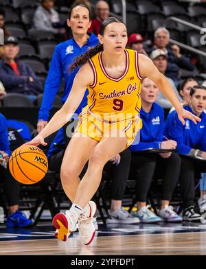 USC Trojans guard Kayleigh Heckel (9) tracks down a loose ball during ...