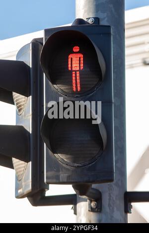 Red traffic light for pedestrians close up in autumn Stock Photo - Alamy