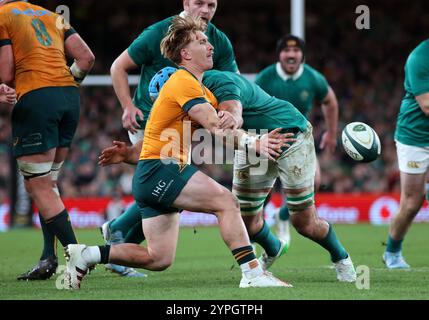 Ireland's Tadhg Beirne is tackled by Australia's Angus Bell during the ...