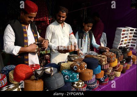 Traditional Sindhi Caps are being selling at a roadside stall in ...