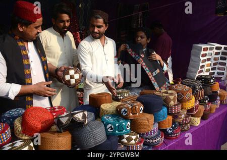 Traditional Sindhi Caps are being selling at a roadside stall in ...