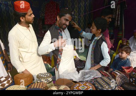 Traditional Sindhi Caps are being selling at a roadside stall in ...