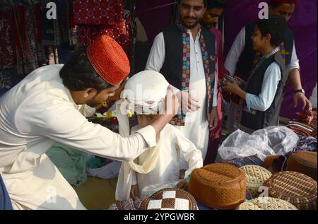 Traditional Sindhi Caps are being selling at a roadside stall in ...