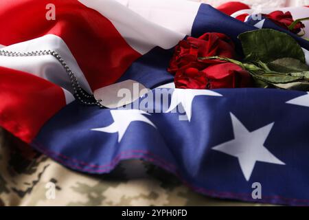 Veterans day. Army token, American flag and roses, closeup Stock Photo ...