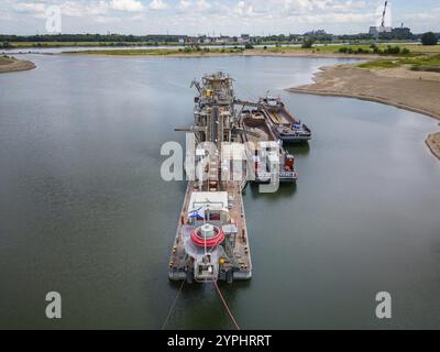 Gravel and sand extraction at the river Rhine using a gravel extractor ...