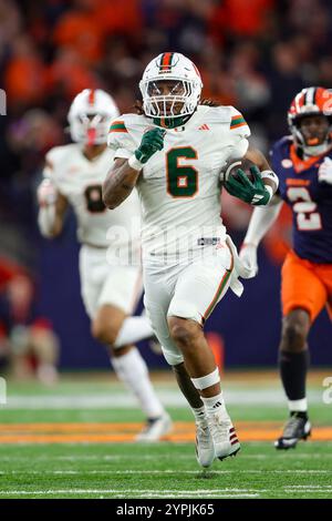 Miami running back Damien Martinez (6) rushes for yardage against Iowa ...