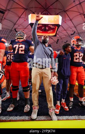 Syracuse head coach Fran Brown speaks as his team warms up before an ...