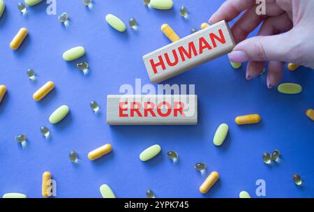 Human Error symbol. Concept word Human Error on wooden blocks ...
