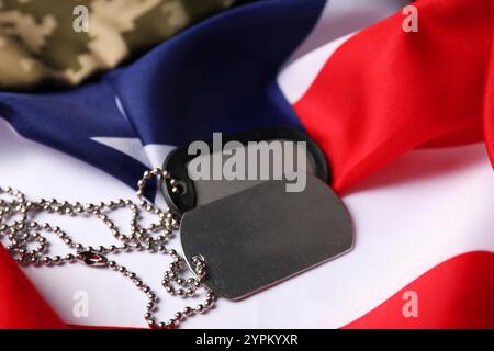 Veterans day. Army tokens and American flag, closeup Stock Photo - Alamy