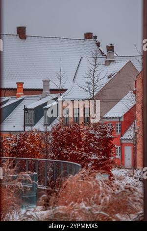 Snowy rooftops of traditional Danish buildings near Hans Christian ...