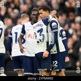 Tottenham Hotspur's Brennan Johnson (right) with his partner Tilde Syah on the pitch after the ...