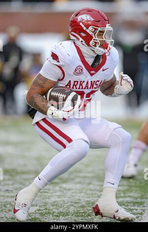 Arkansas running back Ja'Quinden Jackson stretches at the NFL football ...