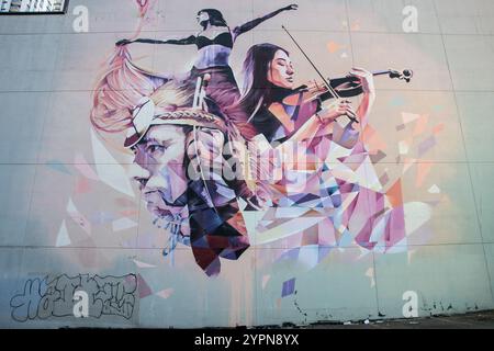 A mural is painted at the All In Music & Arts Festival at the Indiana ...