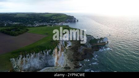 Aerial view of the famous white limestone cliffs near Etretat during ...