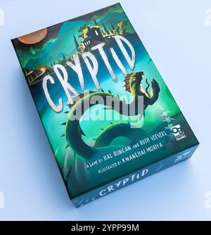 Box containing the Cryptid deduction board game Stock Photo - Alamy