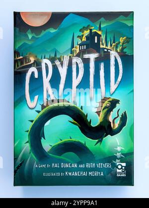 Box containing the Cryptid deduction board game Stock Photo - Alamy