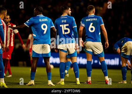 Ethan Pye #15 of Stockport County F.C.warms-up before the match during ...